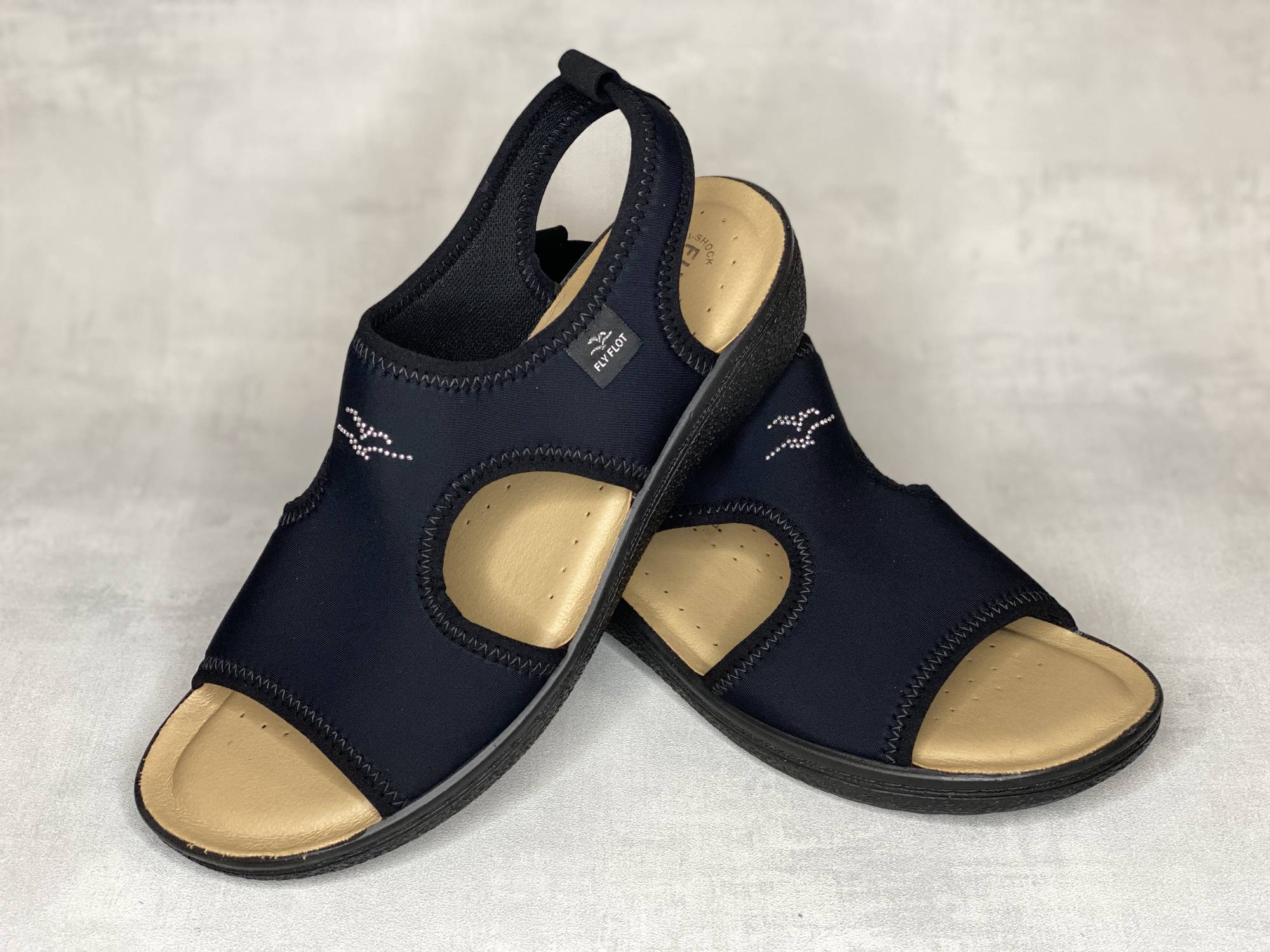 Fly Flot Stretch sandaali pikkustrassi Musta stretch sandaali ...